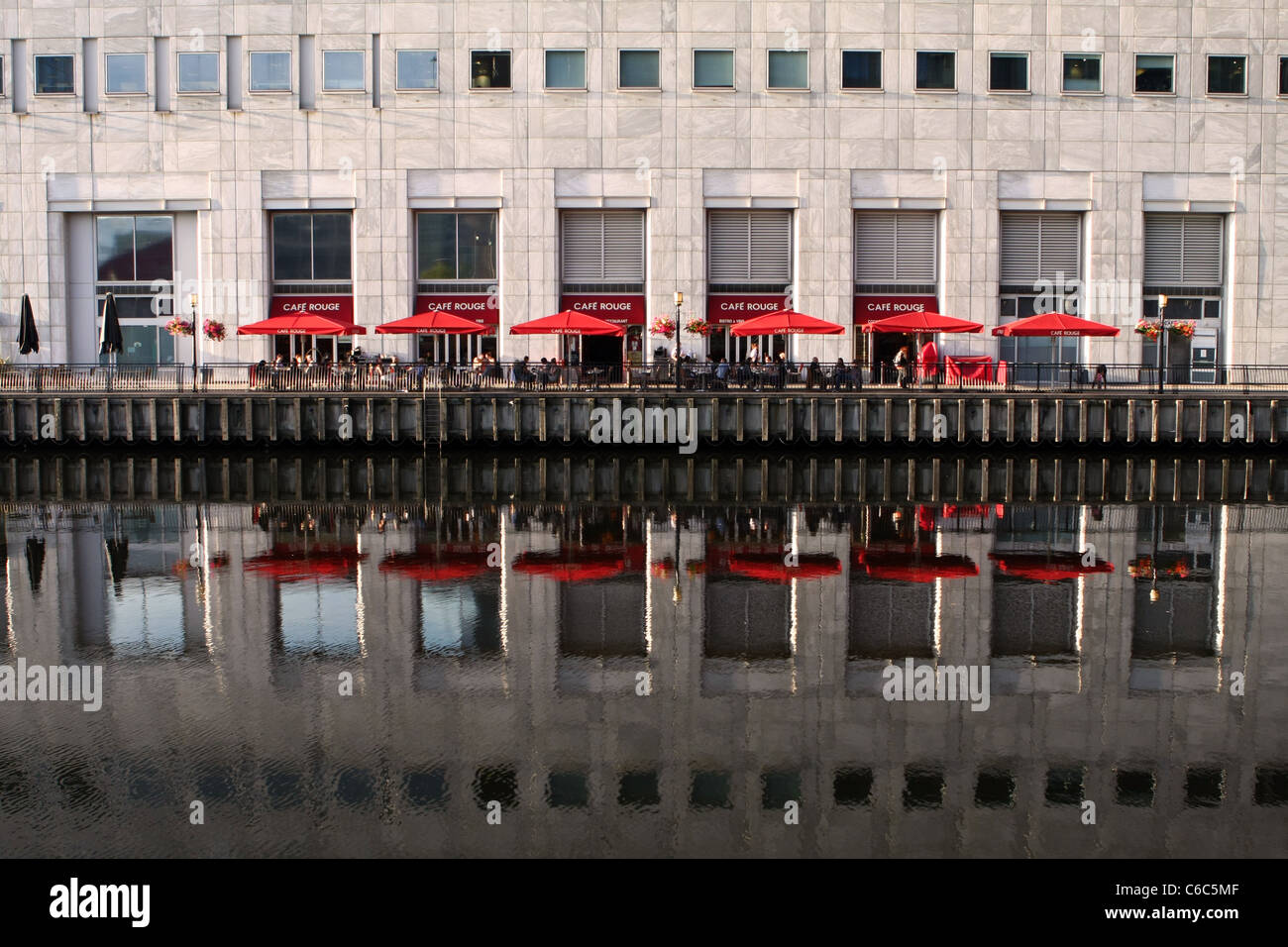 Café Rouge and its reflections in Middle Dock, Canary Wharf, London ...