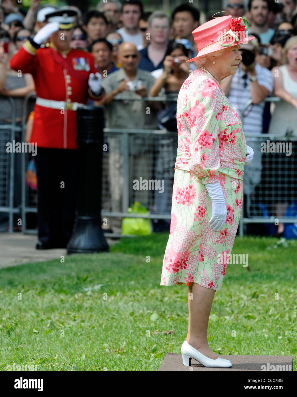 Queen Elizabeth II unveiling a commemorative plaque marking 150 years ...
