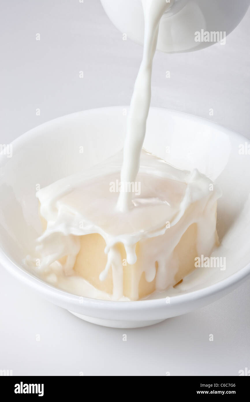Milk Poured Over Cheese Stock Photo - Alamy