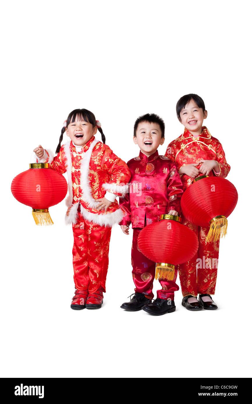 Three Chinese children holding Chinese lanterns Stock Photo - Alamy
