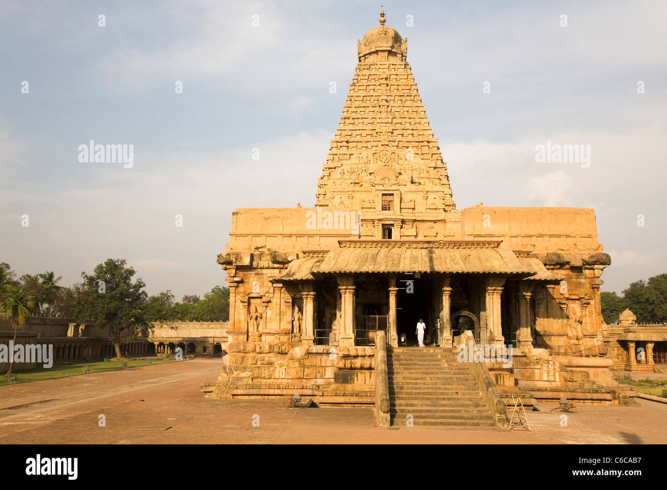 A temple stands in front of the Vimana (Temple Tower) at the ...