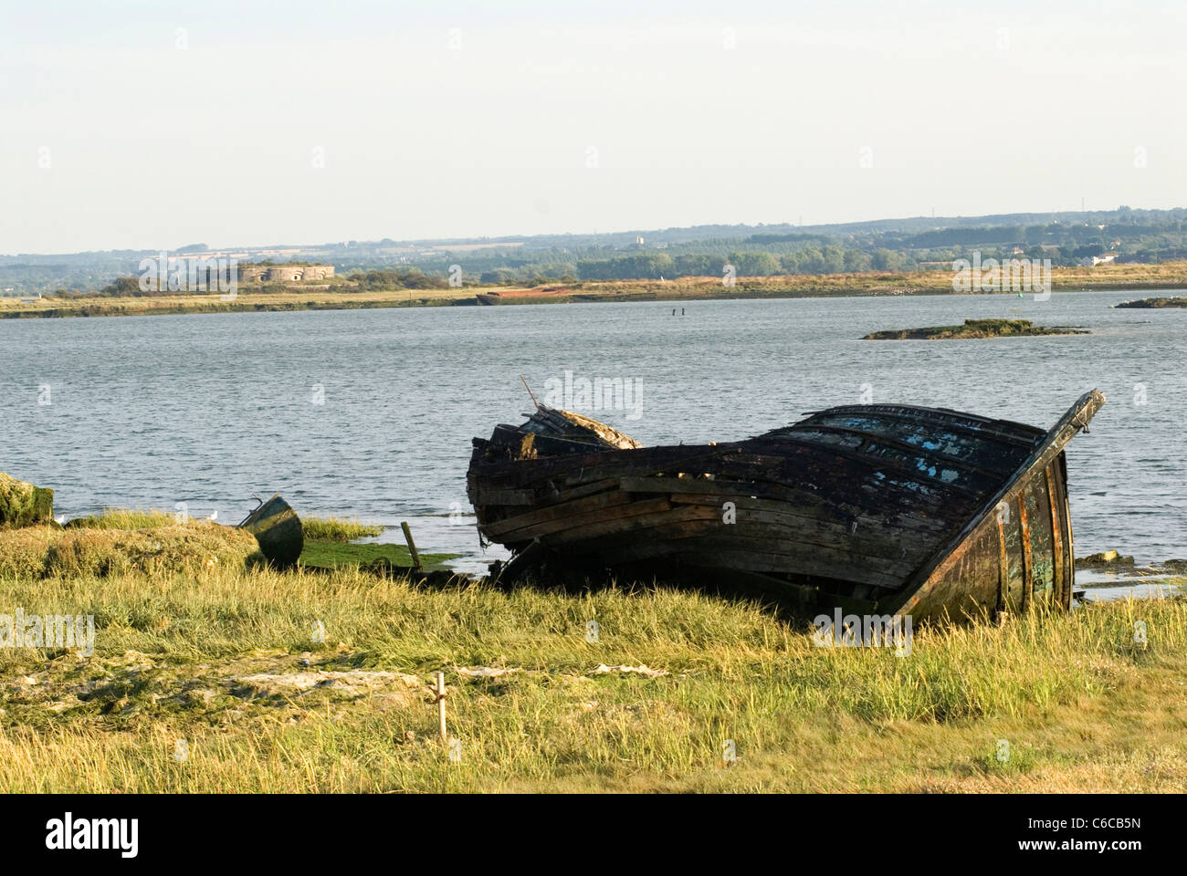River Medway, Hoo St Werburgh Kent. Medway river estuary derelict abandoned boats. Ship wrecks ...