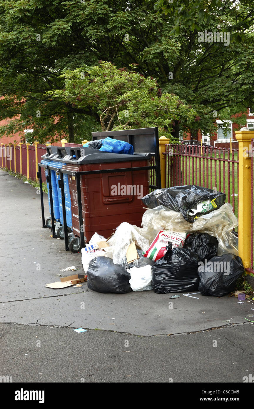 Full communal recycling bins hi-res stock photography and images - Alamy