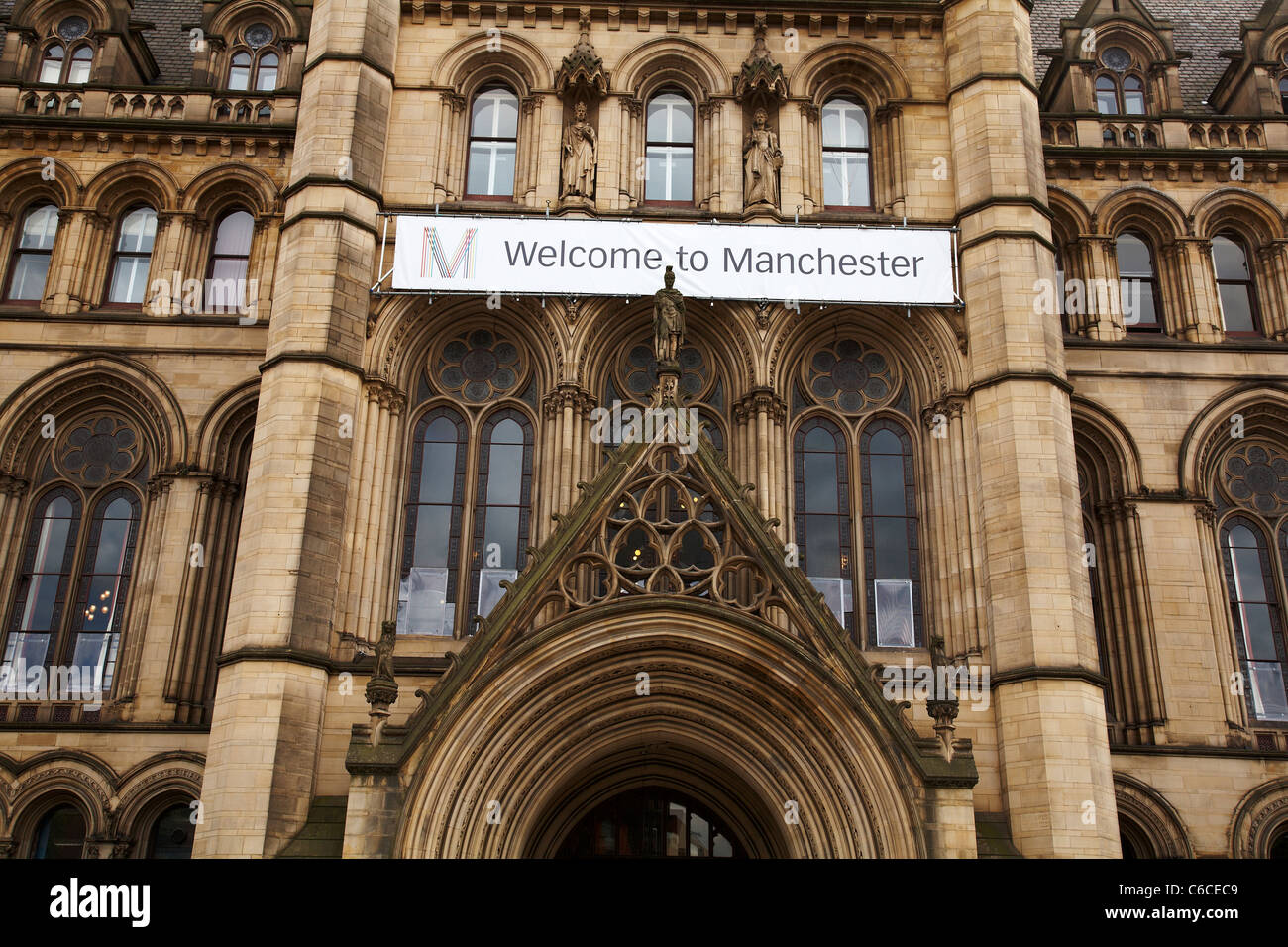 Welcome to Manchester banner on Town hall in Manchester UK Stock Photo ...