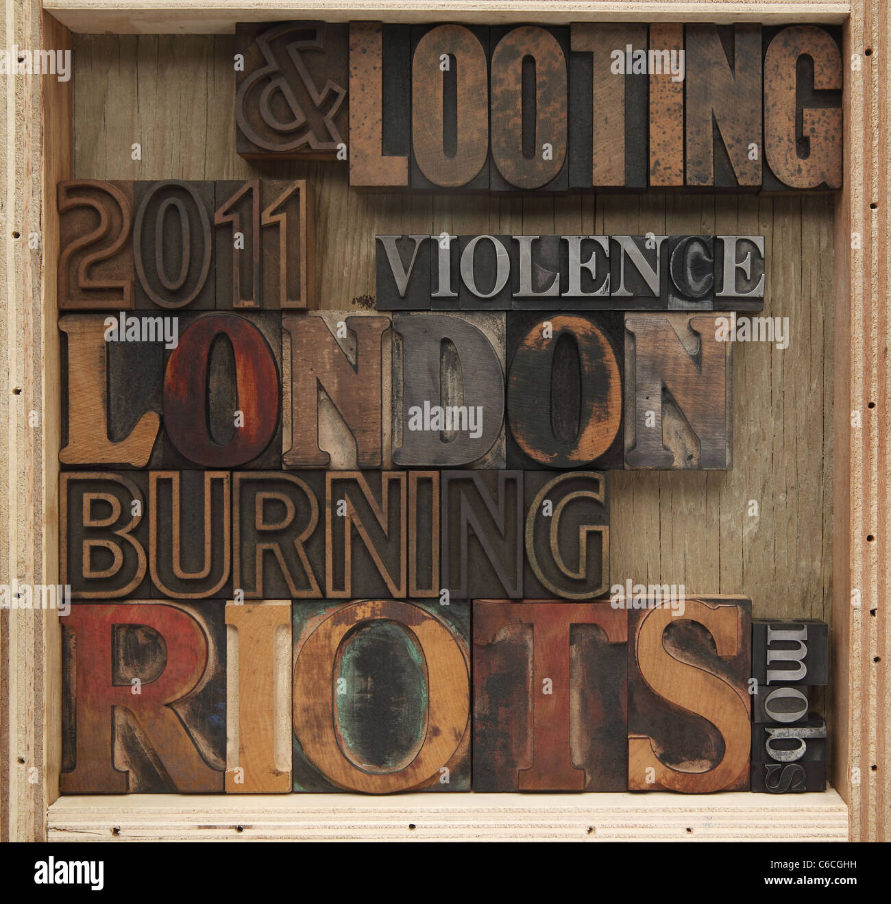 London riot words in old wood and metal type Stock Photo - Alamy