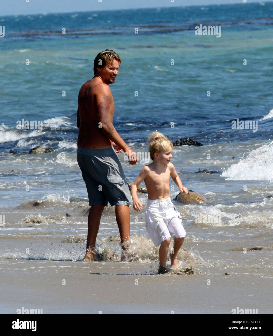 Sean Stewart and his brother Alistair Stewart spend the day the beach ...