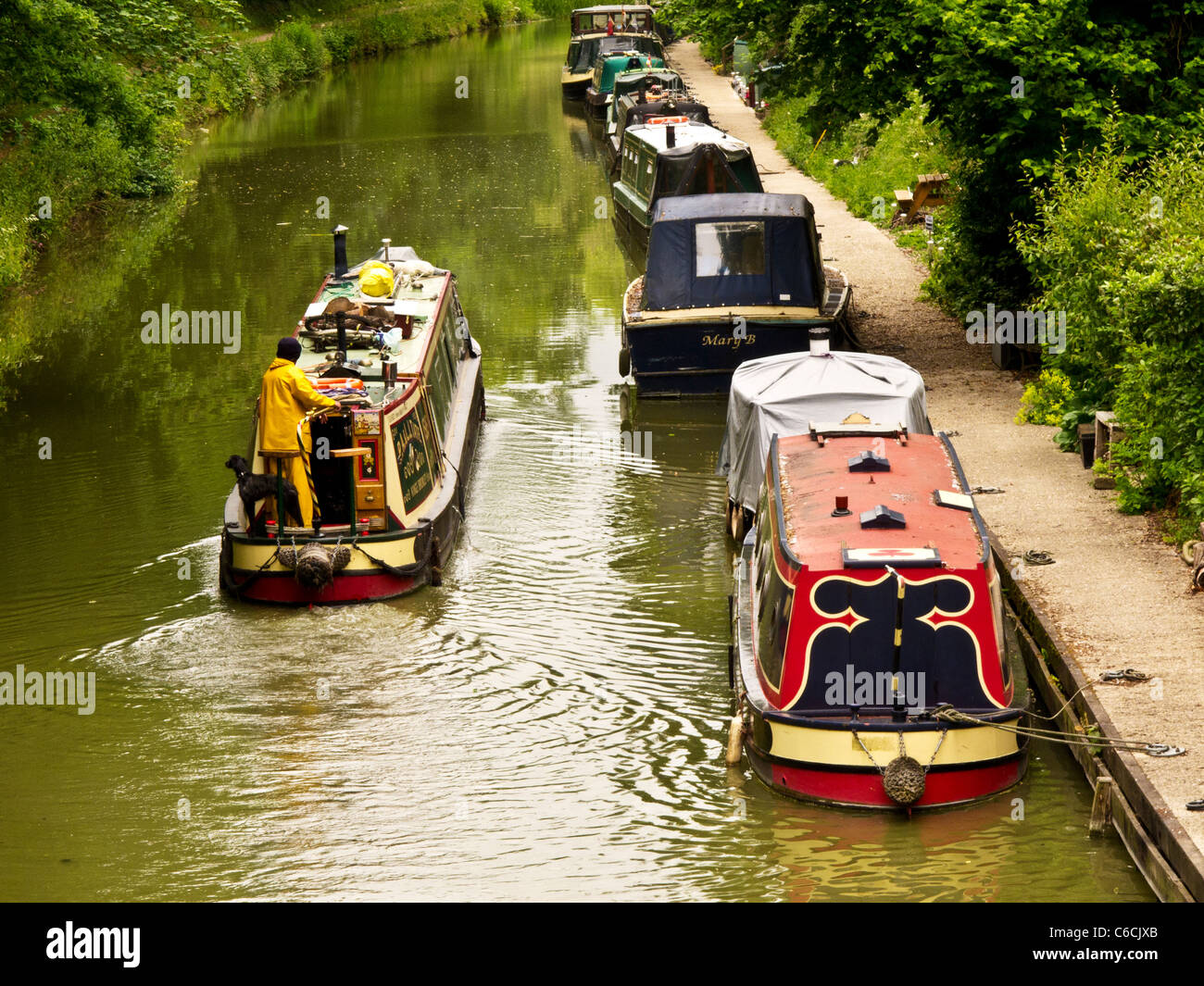 A canal scene with narrowboats near Pewsey Wharf on the Kennet and Avon ...