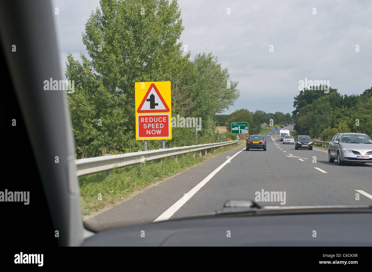 Road sign reduce speed now hi-res stock photography and images - Alamy
