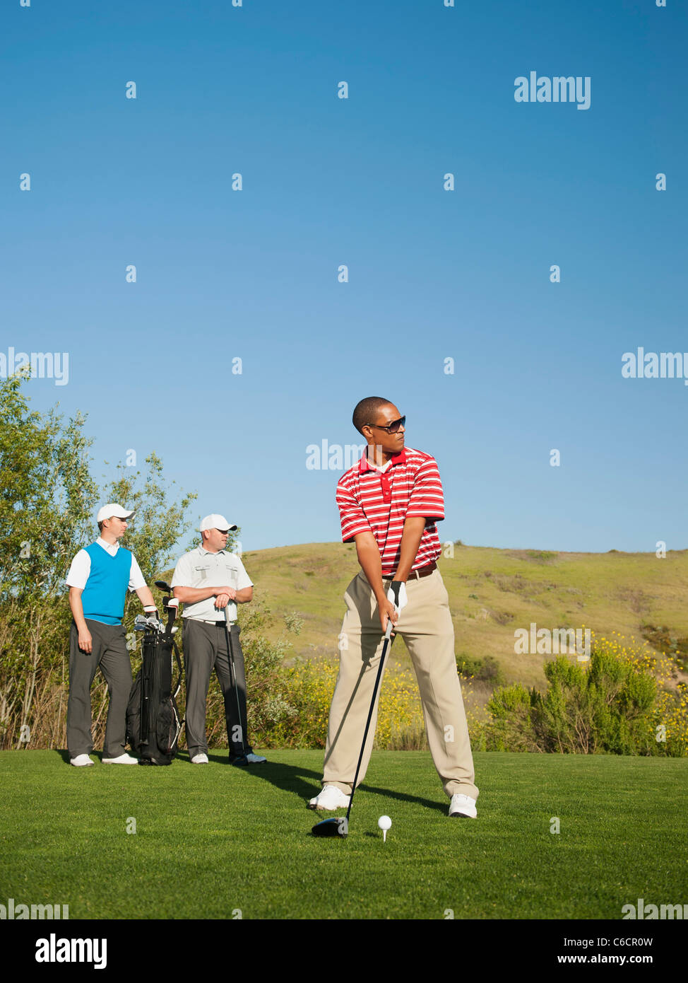 Golf course men three hi-res stock photography and images - Alamy