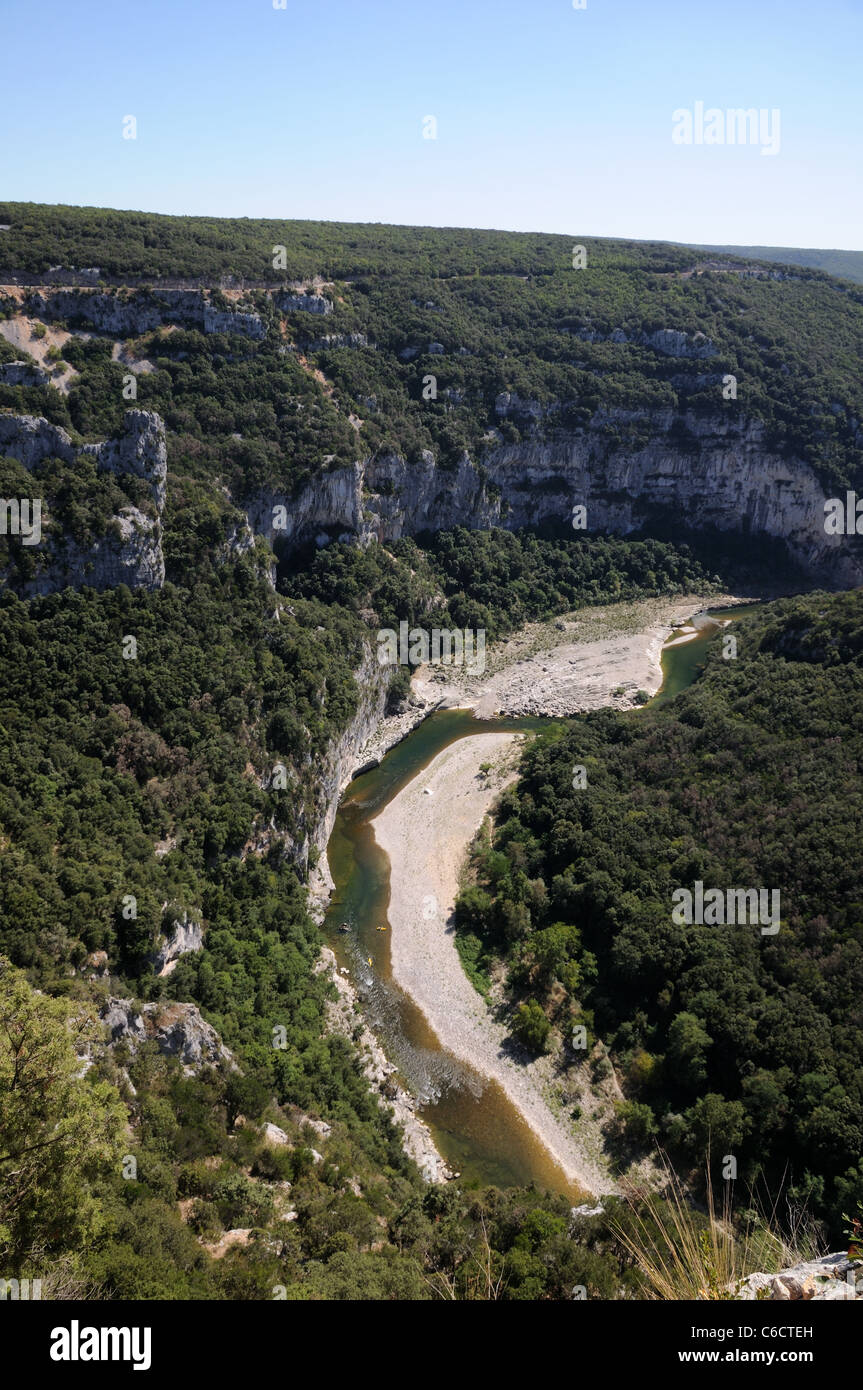 Dramatic view looking down into the Gorges d’Ardeche with the river far ...