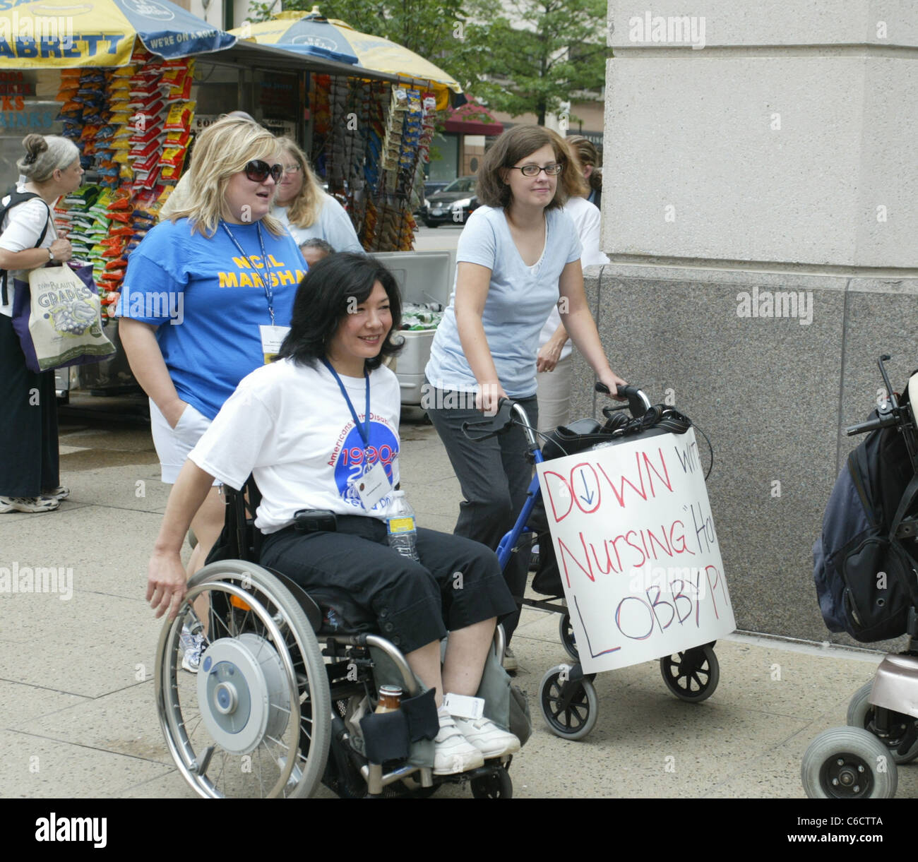 Disabled Americans march in support of the 20th anniversary of the ADA ...