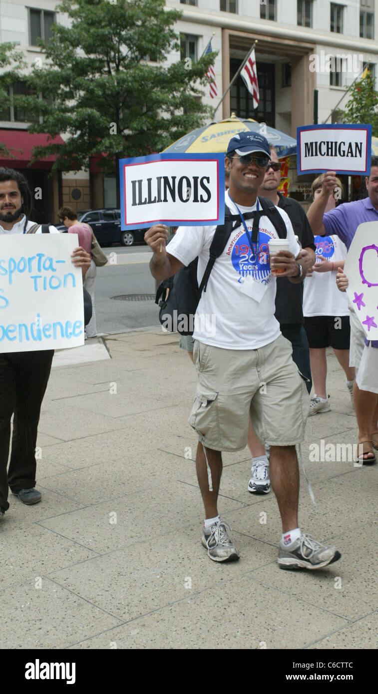 Disabled Americans march in support of the 20th anniversary of the ADA ...