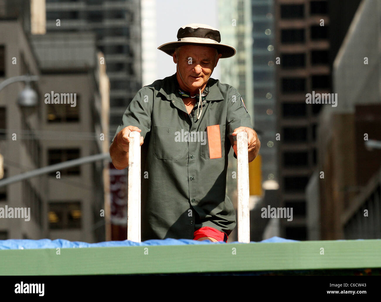 Bill Murray diving into a makeshift pool while filming a segment ...