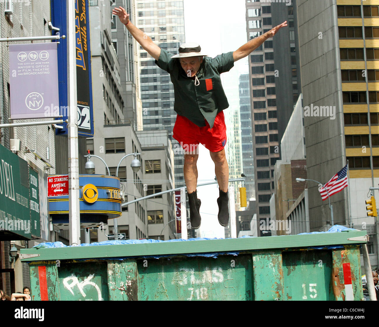 Bill Murray diving into a makeshift pool while filming a segment ...