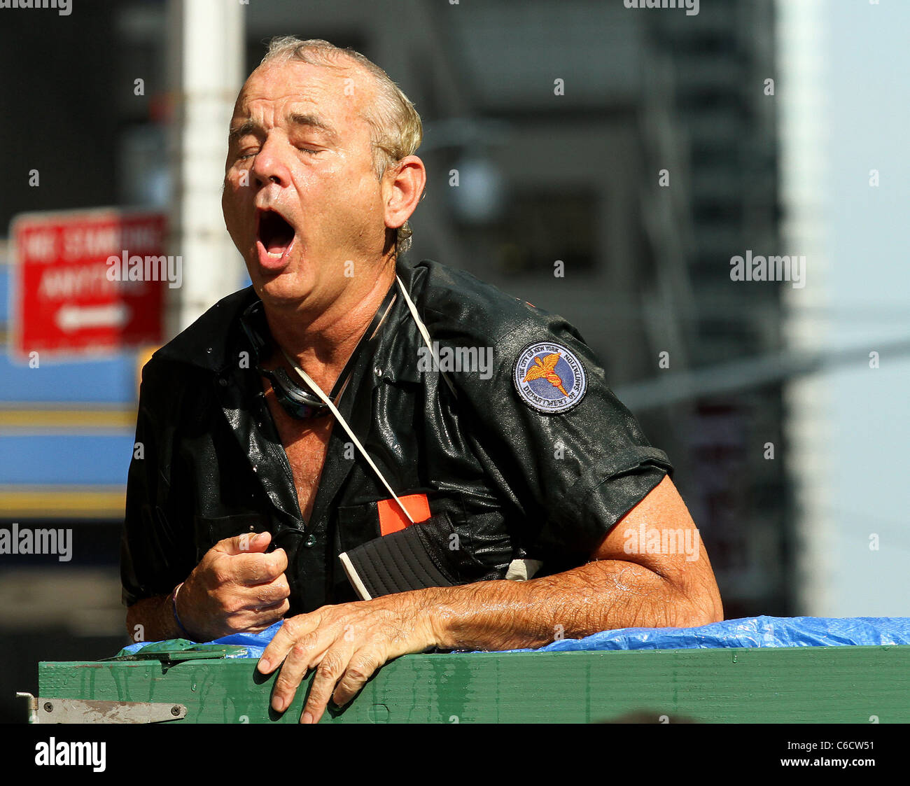 Bill Murray wet after diving into a makeshit pool while filming a ...