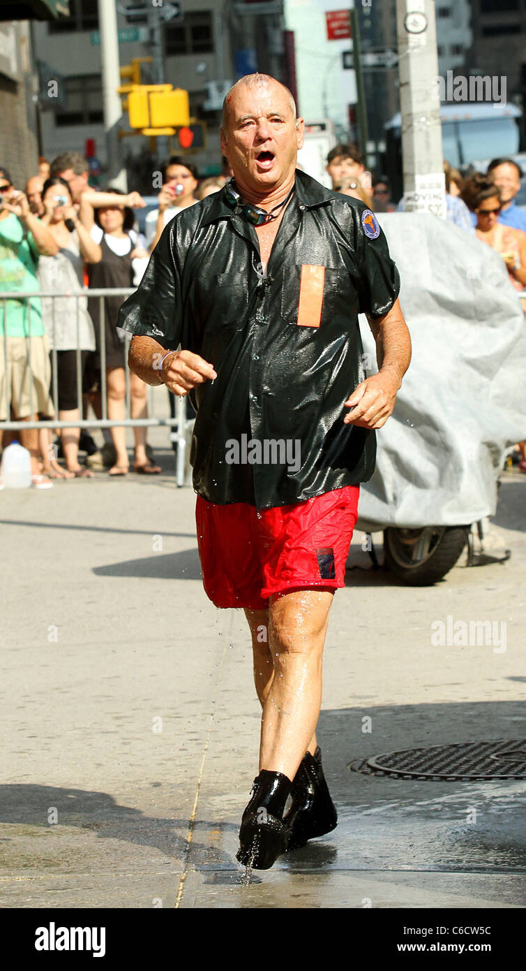 Bill Murray wet after diving into a makeshit pool while filming a ...