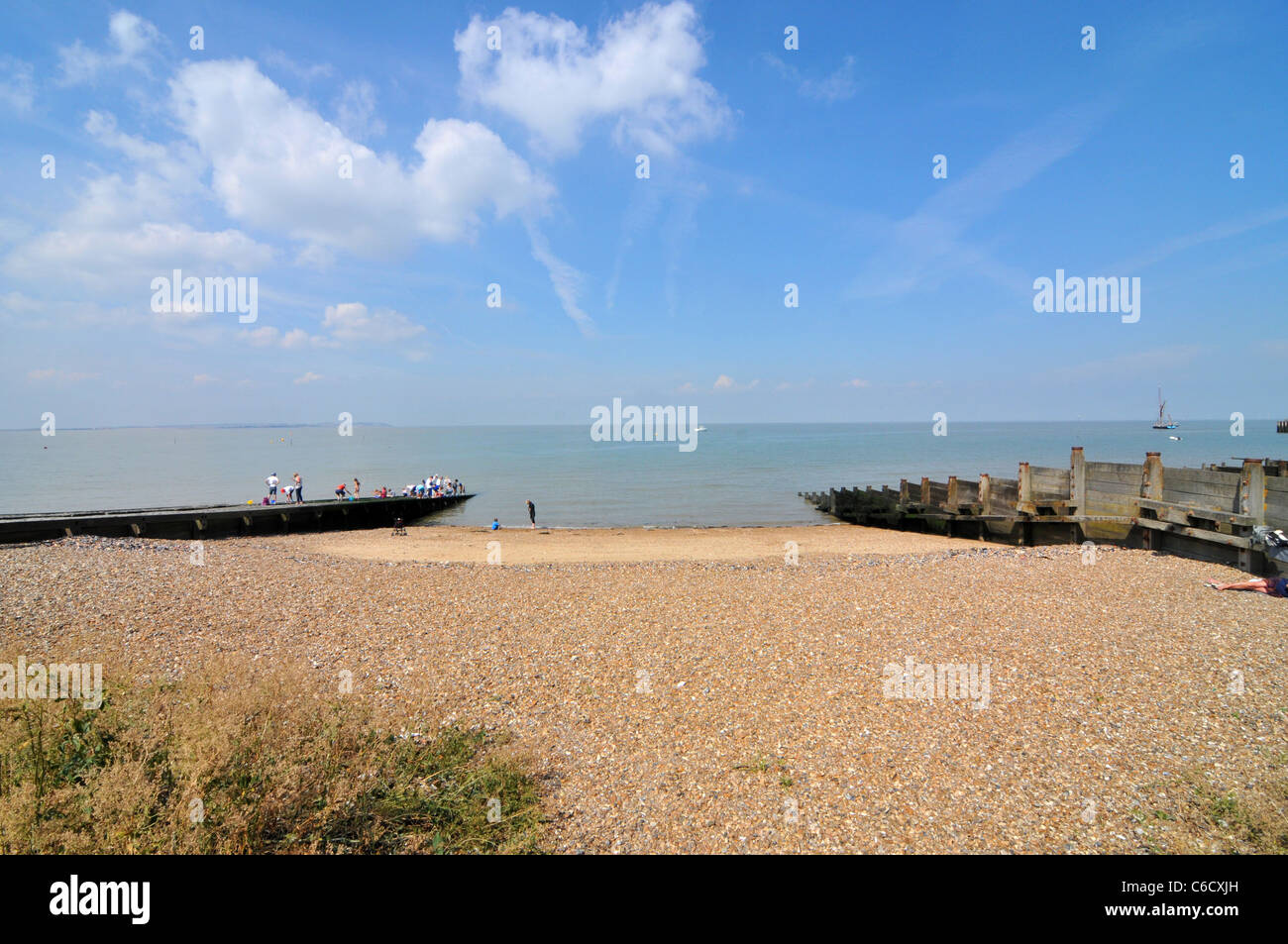 Whitstable Kent Seaside town beach groins sea defence Stock Photo - Alamy