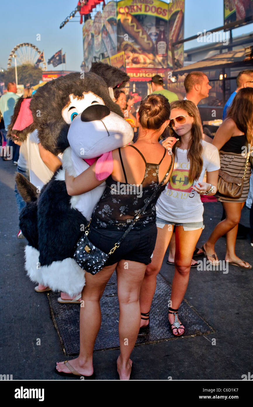 The winner of a furry dog prize at the amusement park of the Orange ...