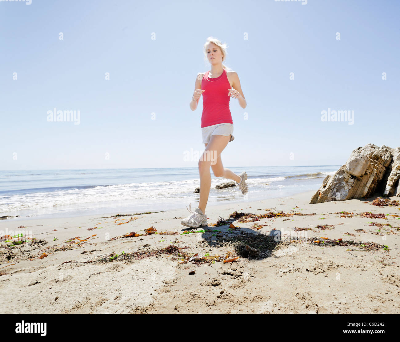 Run beach hi-res stock photography and images - Alamy