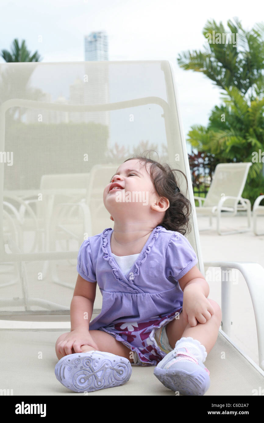 Cute happy one year old baby looking up in a relax place Stock Photo ...