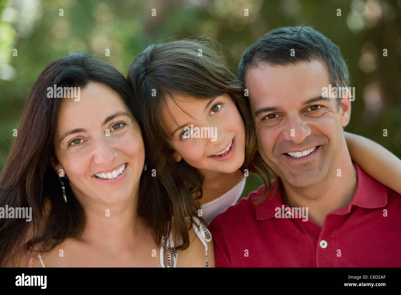 Smiling Hispanic family Stock Photo - Alamy