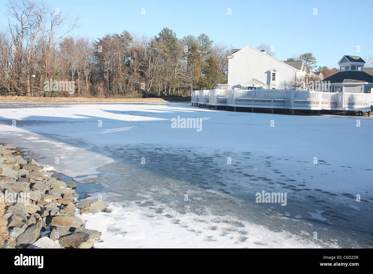 Frozen river in countryside during winter time Stock Photo - Alamy