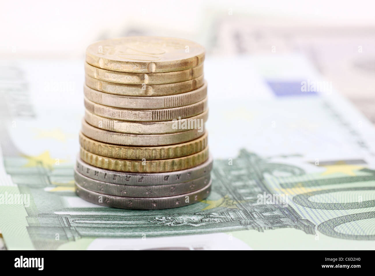 pile of euro coins on banknotes Stock Photo - Alamy