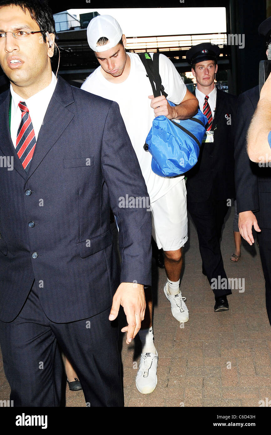 John Isner of Tampa, Florida, leaving court after his match with ...