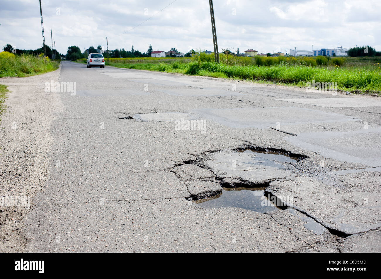 Road chuckholes hi-res stock photography and images - Alamy