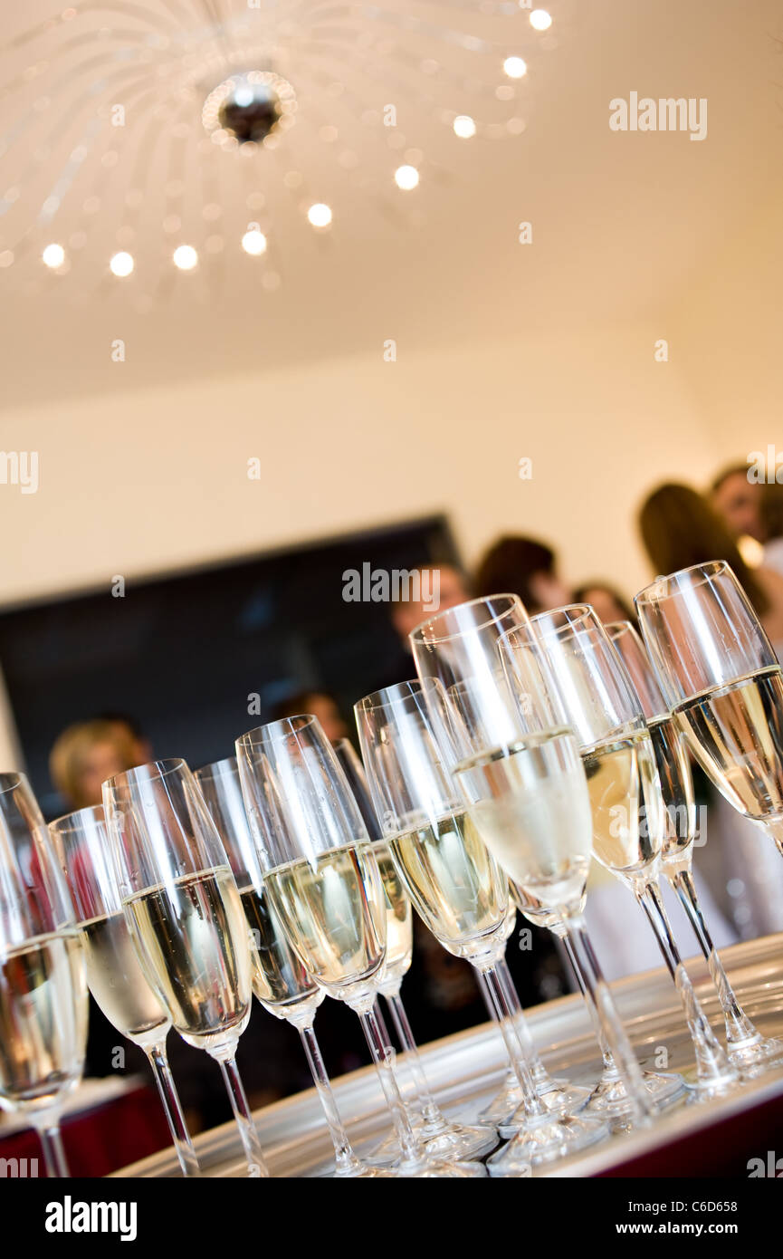 little reception with champagne in glasses Stock Photo - Alamy