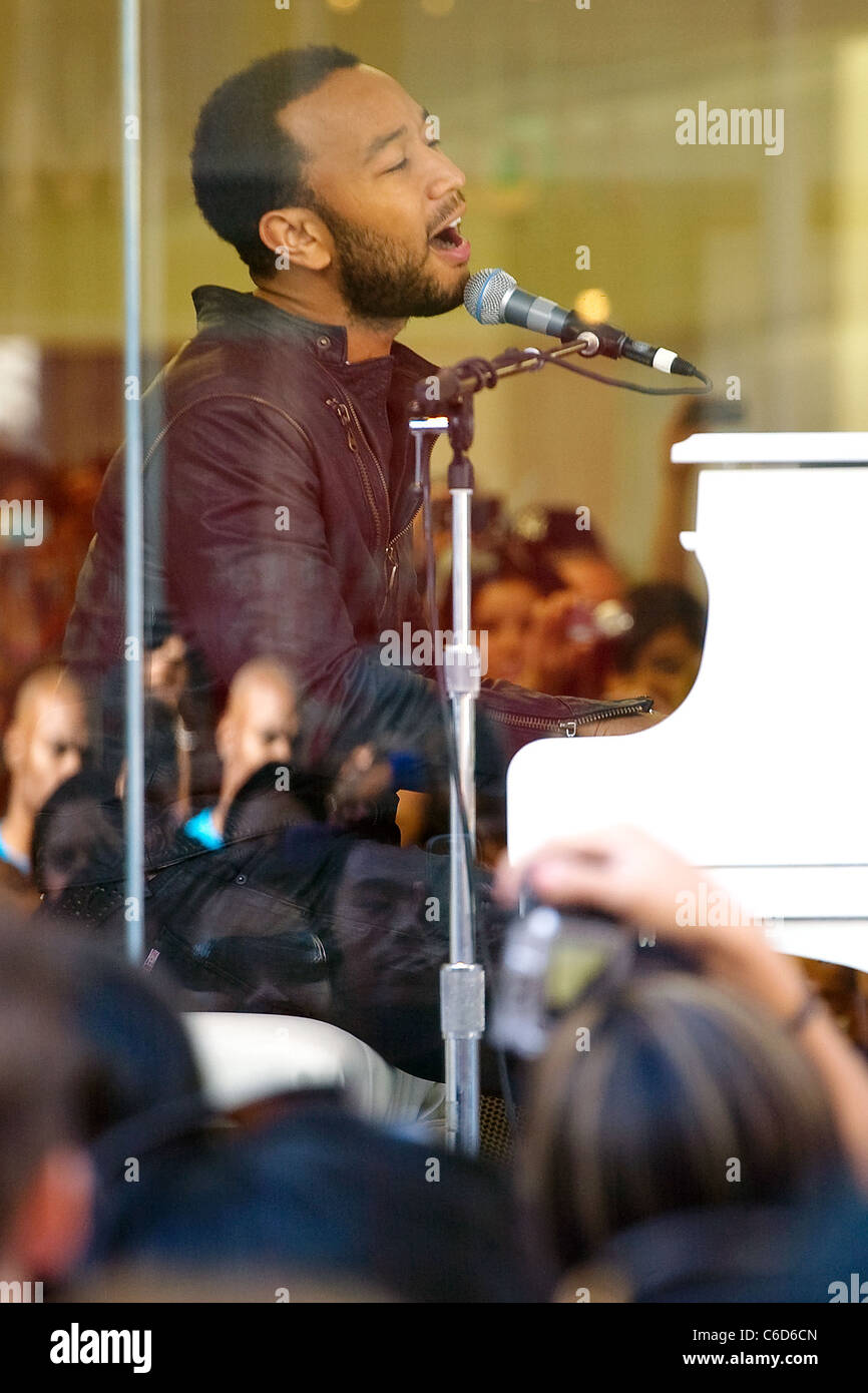 John Legend performing live in a free concert as part of the opening ...