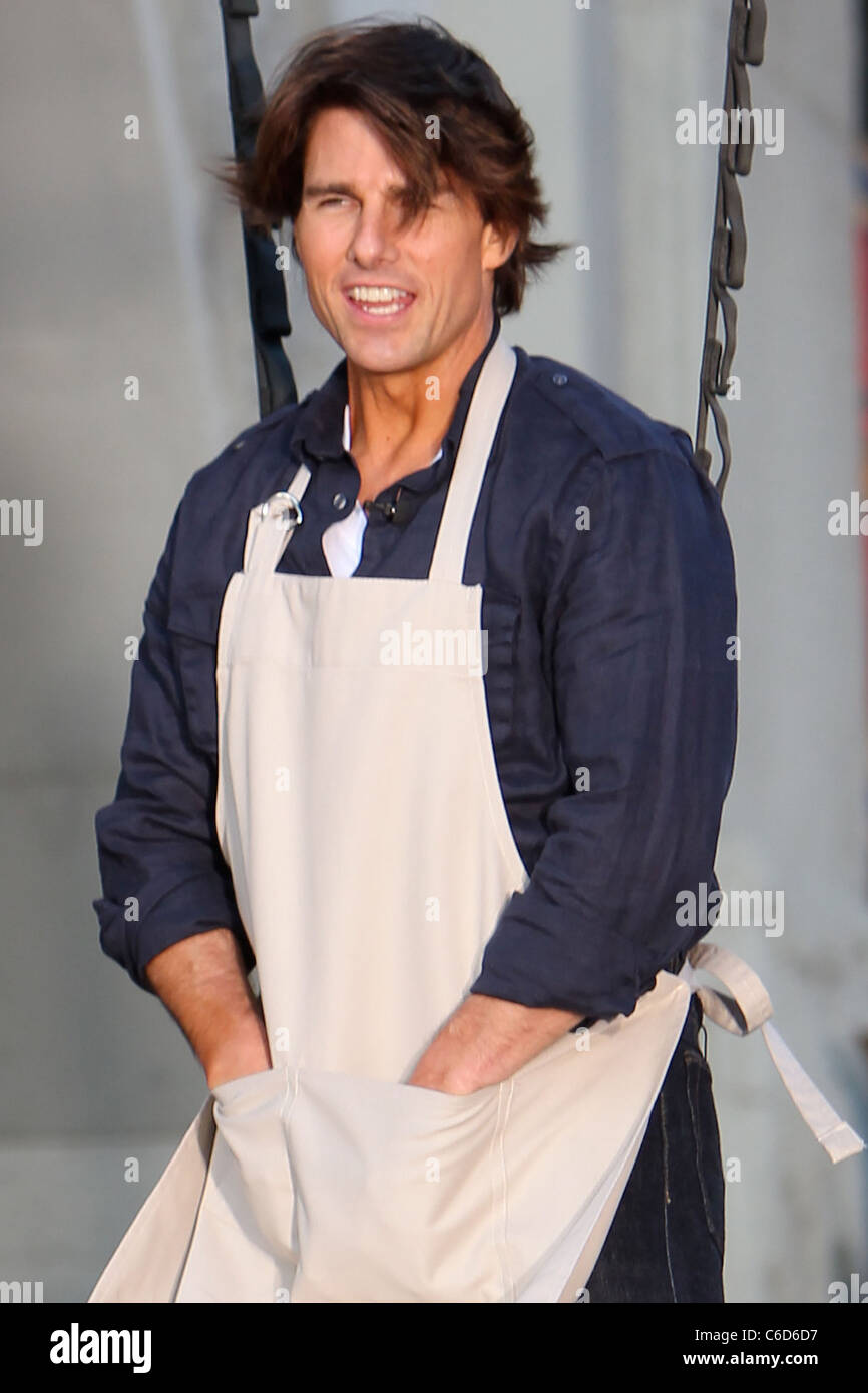 Tom Cruise hanging on a harness outside El Capitan Theatre during a ...
