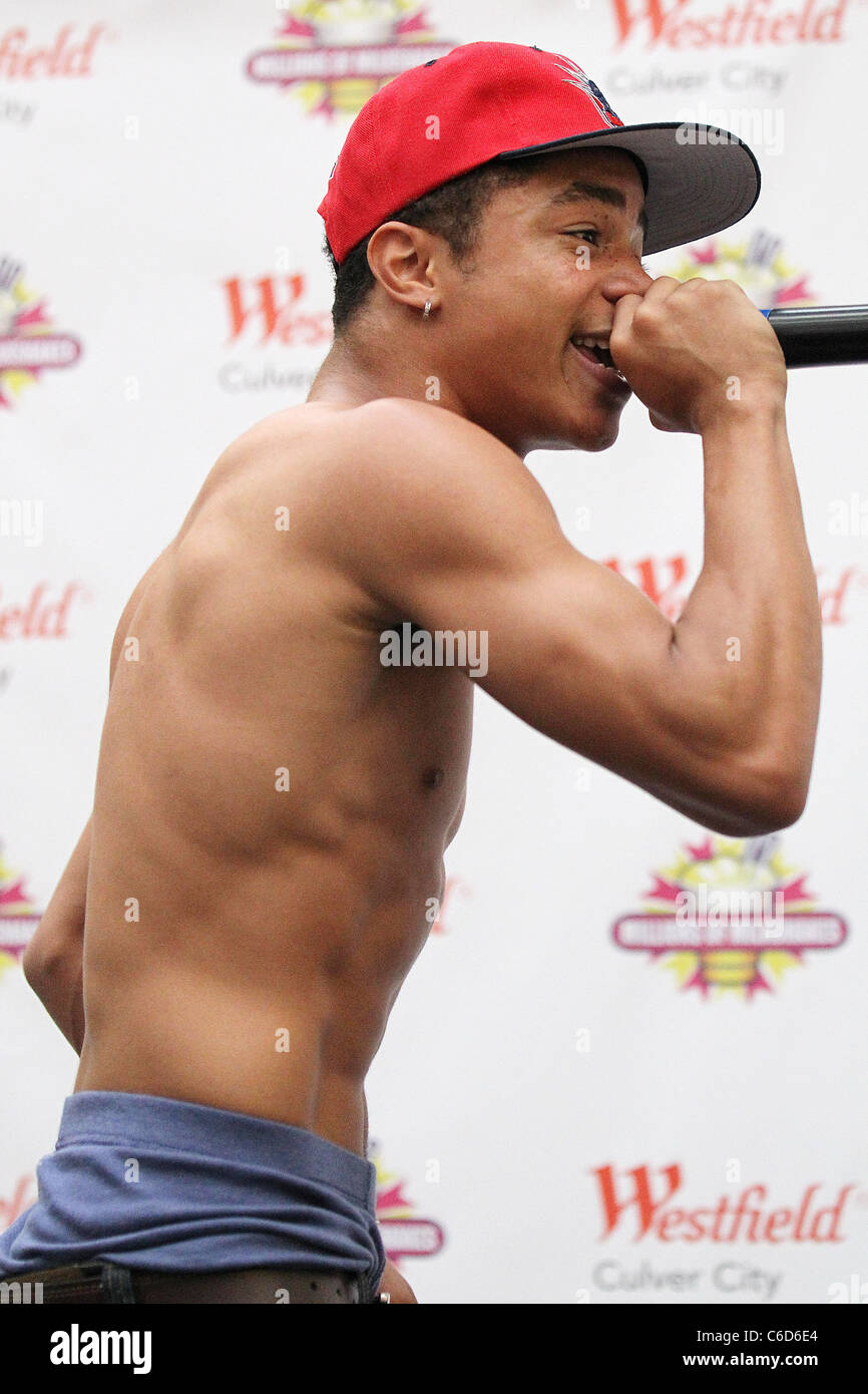 Rap group New Kids performing at the Grand opening of Millions of ...