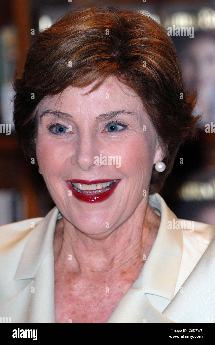 Laura Bush signs copies of her memoir 'Spoken From The Heart' at Books ...