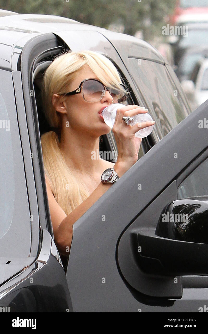 Paris Hilton drinking water as she arrives at KIIS FM Studios Los ...