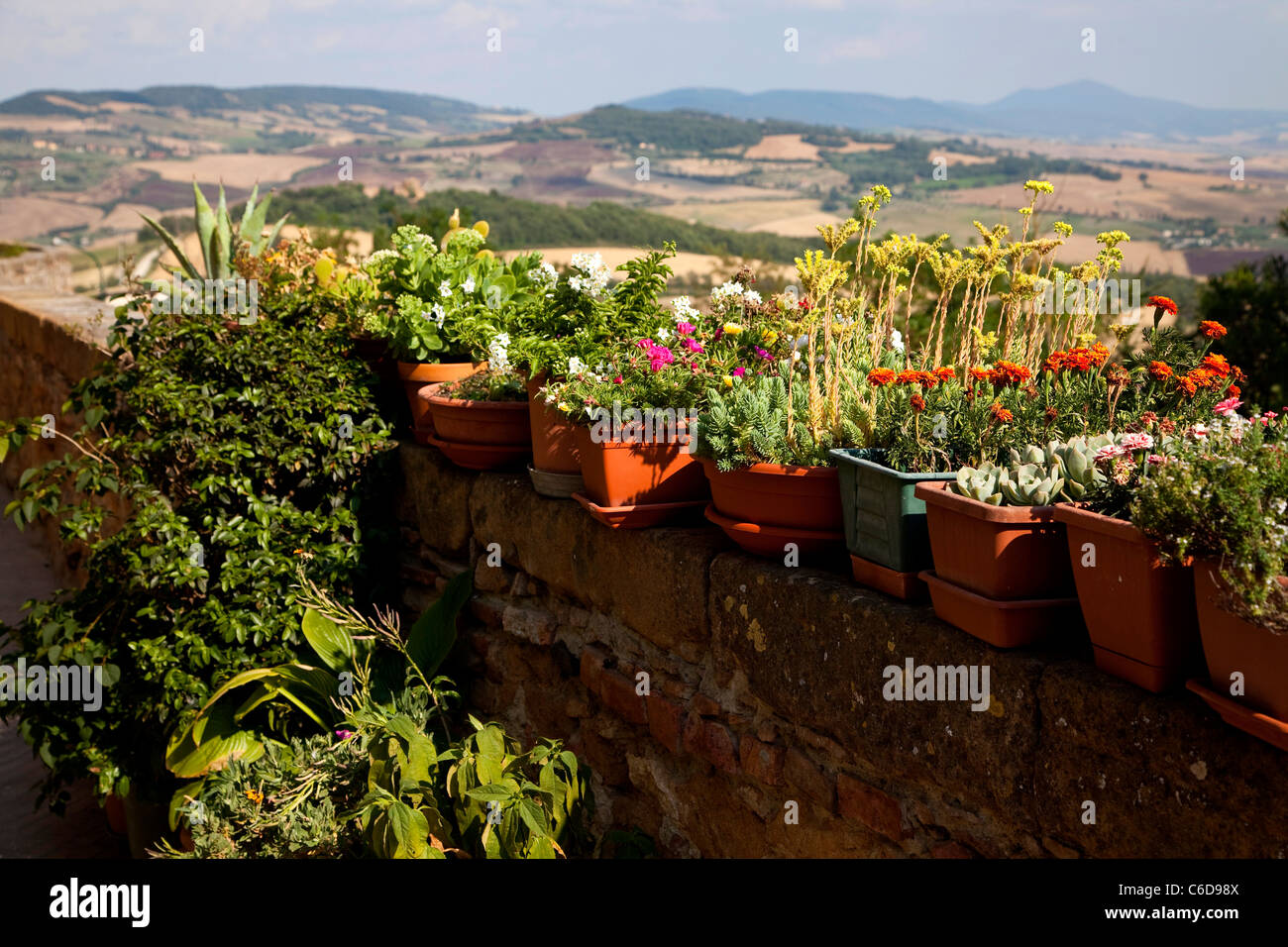 Pots with flowers and plants, Pienza, Tuscany, Italy Stock Photo - Alamy