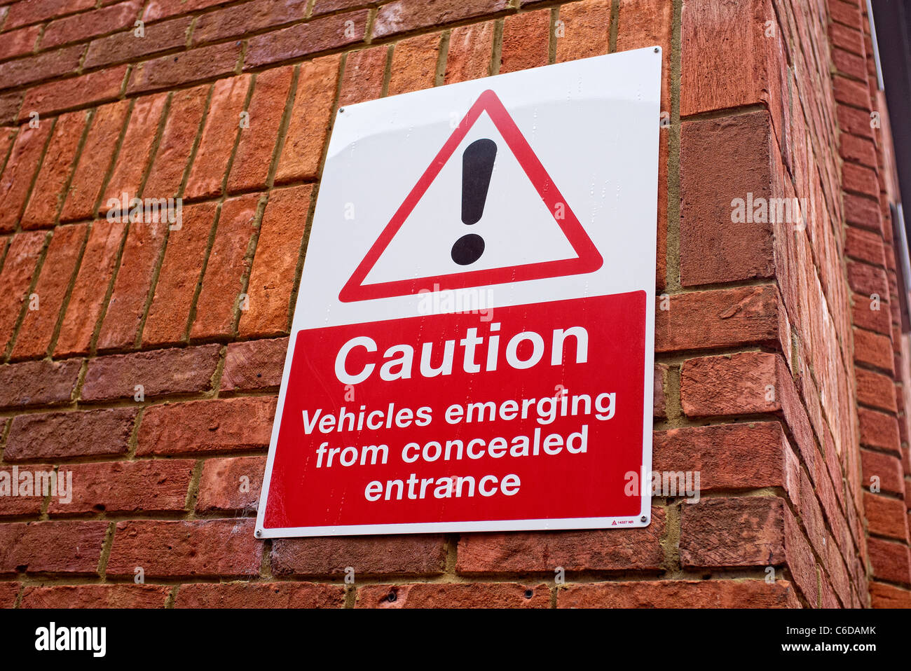 warning caution sign on a wall Stock Photo - Alamy