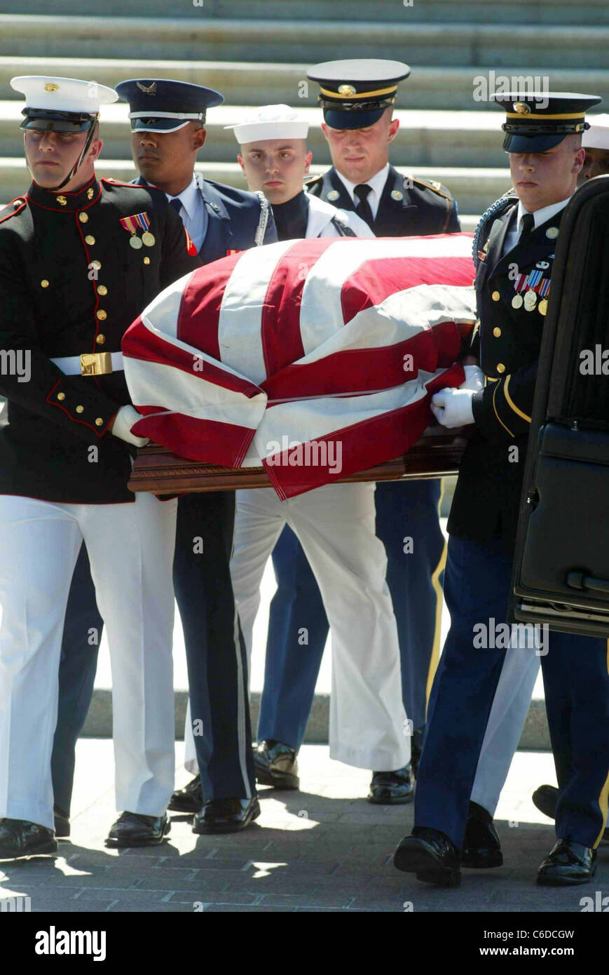 US military Honor Guard carry the casket of Senator Robert Byrd, (D-WV ...