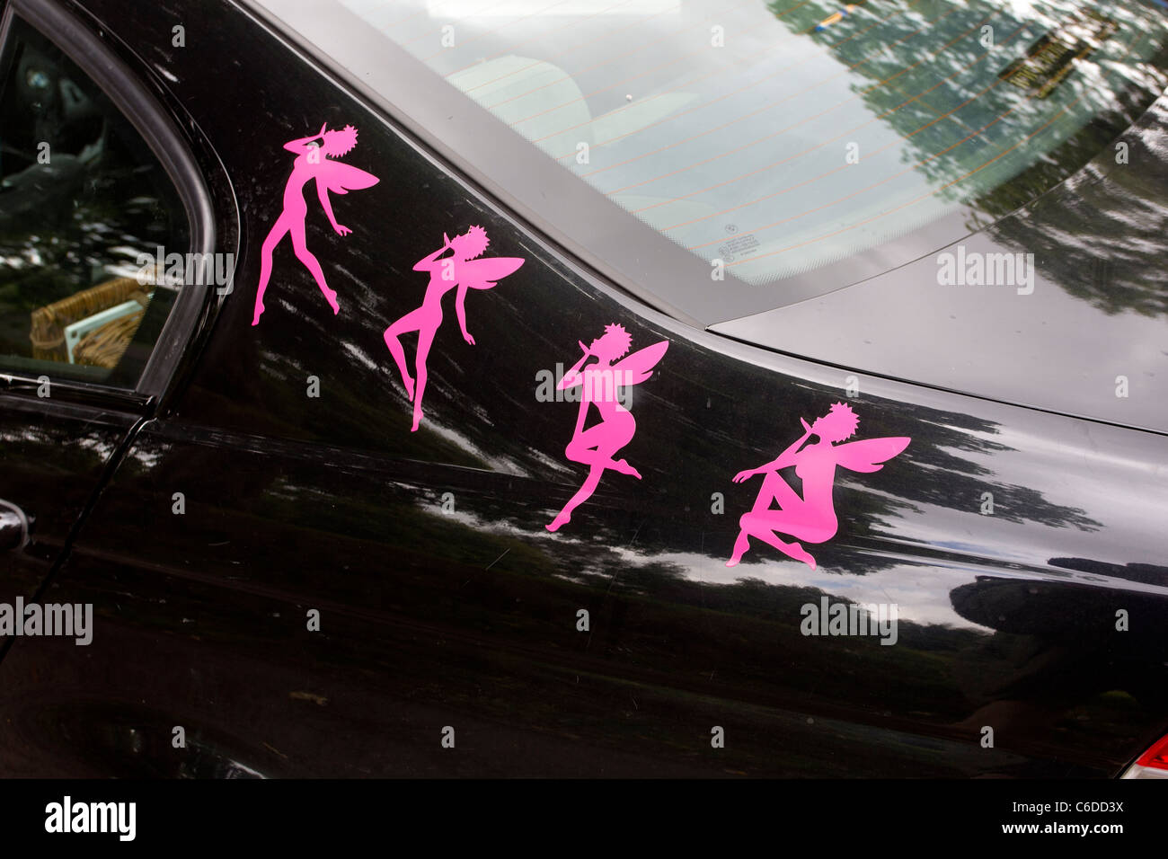 Tinkerbell pink fairy transfers on car Stock Photo - Alamy