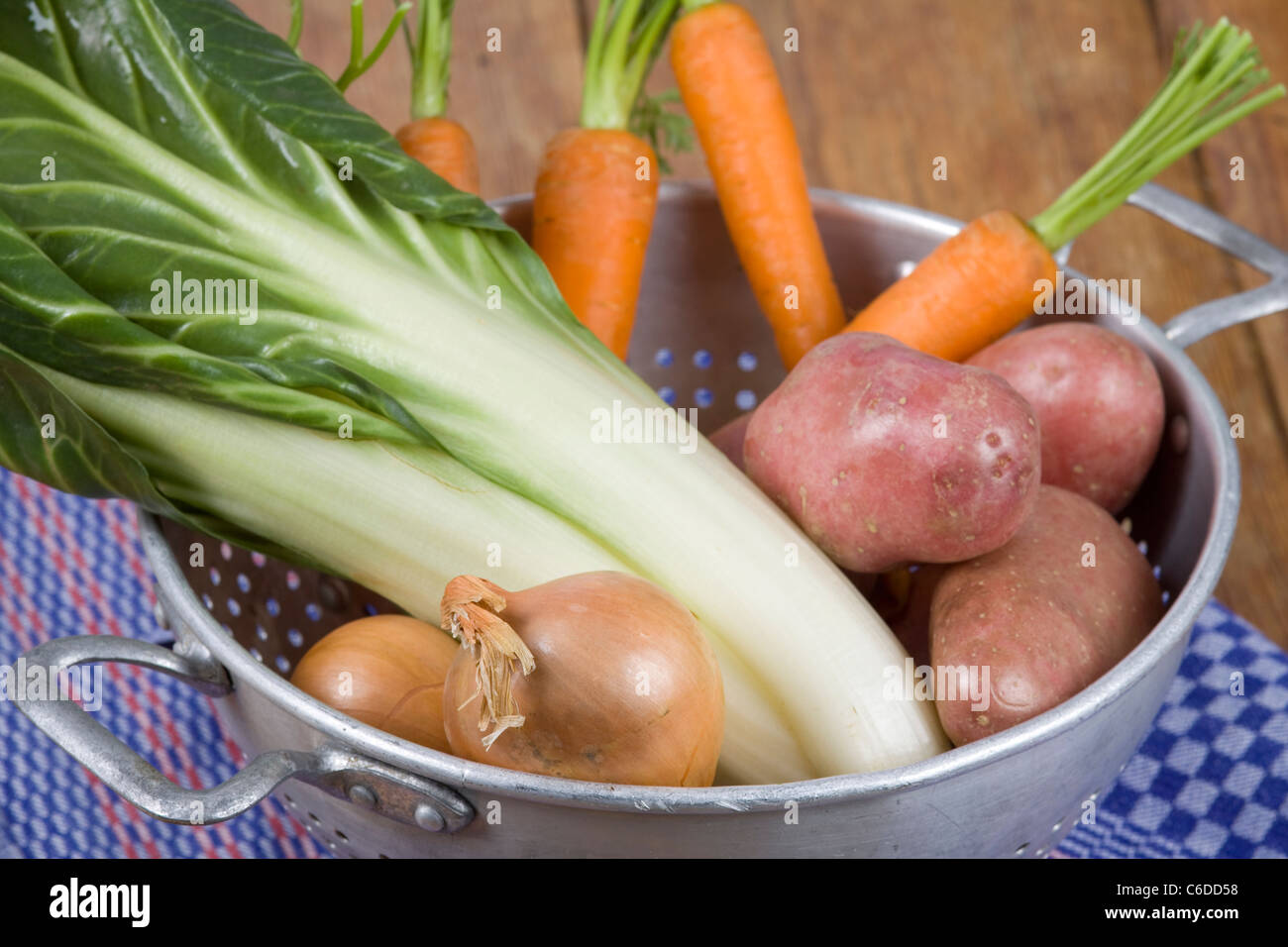 Sieve with various vegetables Stock Photo - Alamy