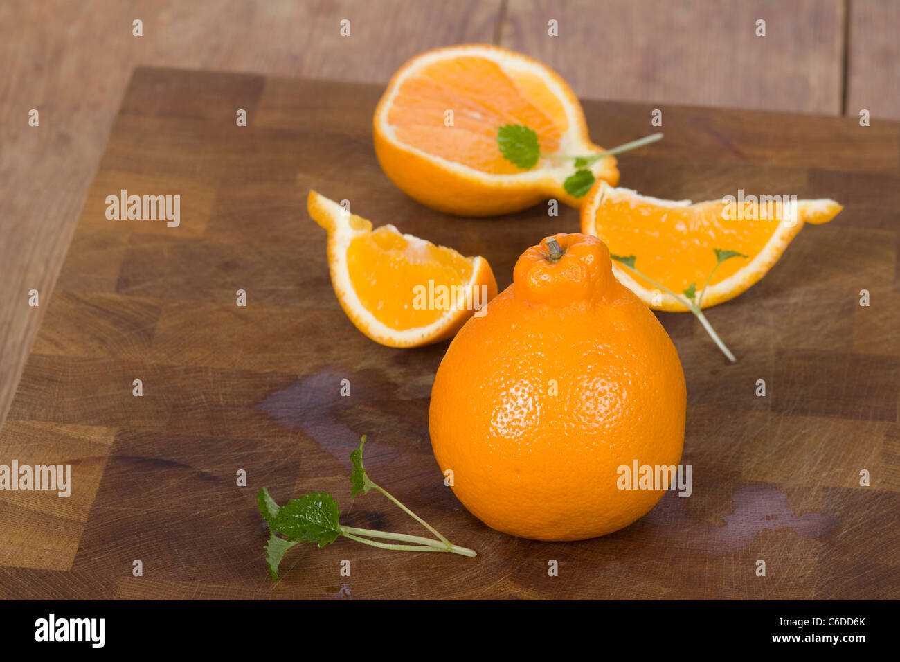 Orange with a large stem base Stock Photo - Alamy