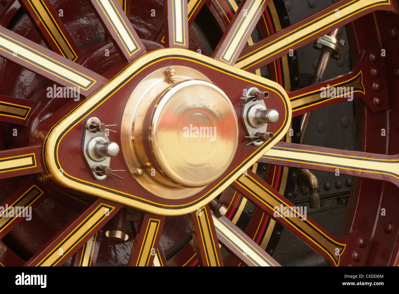 Close up of the spokes of a traction engine wheel showing the detail ...
