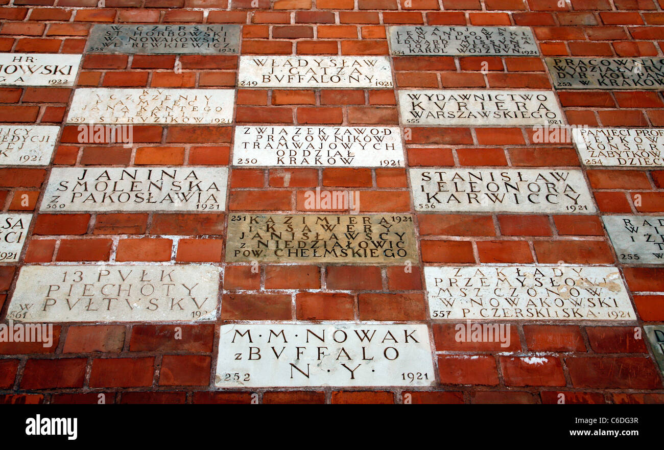 Poland Krakow Wawel names in wall Stock Photo - Alamy