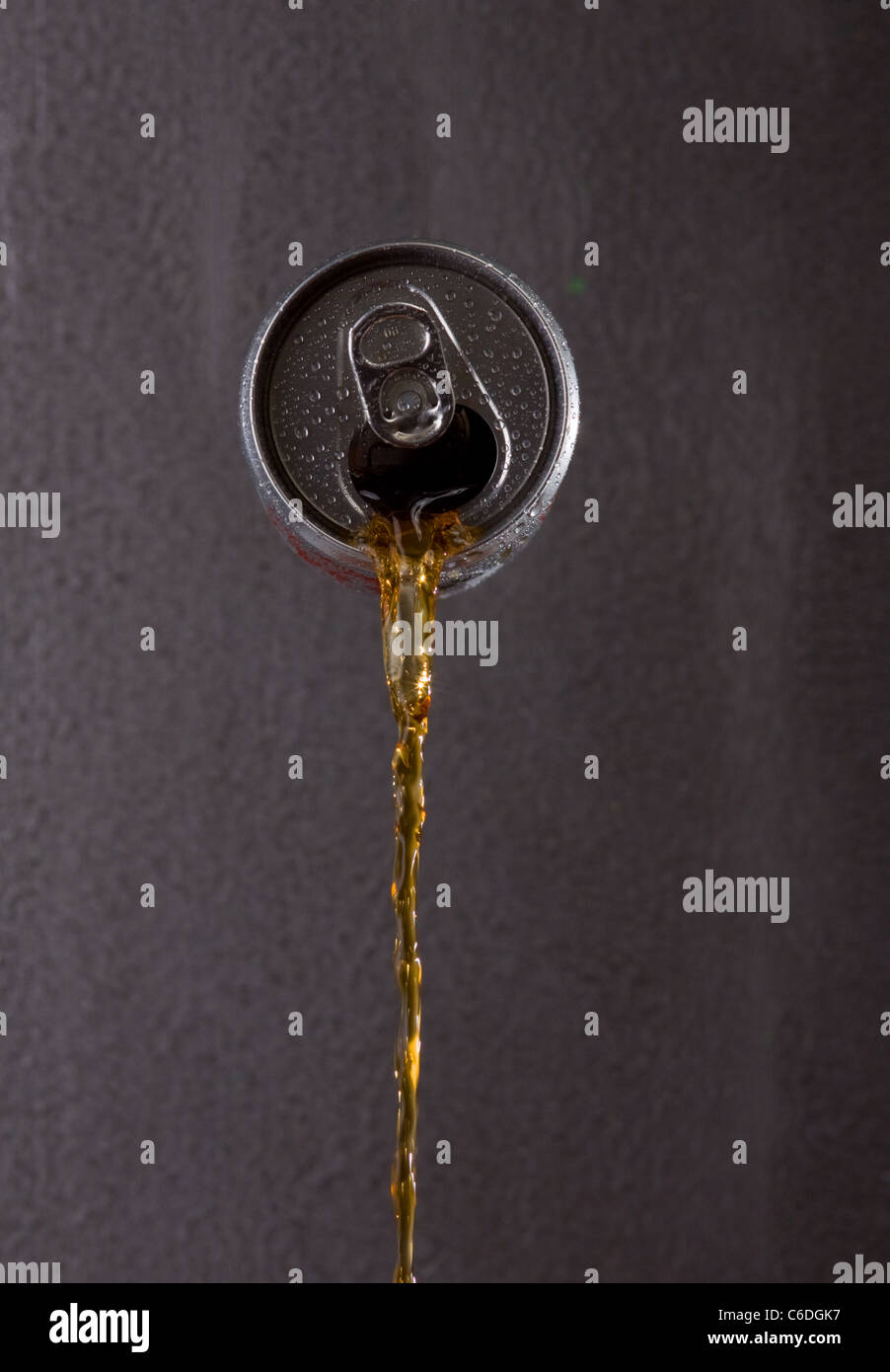 Beverage can is poured Stock Photo - Alamy