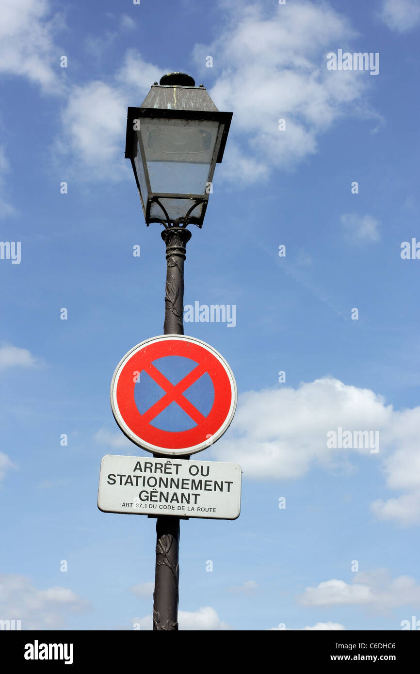 A french lamp post with 'no stopping' sign Stock Photo - Alamy