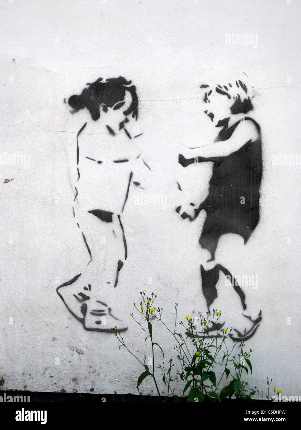 Graffiti on wall showing children playing Sheffield South Yorkshire ...
