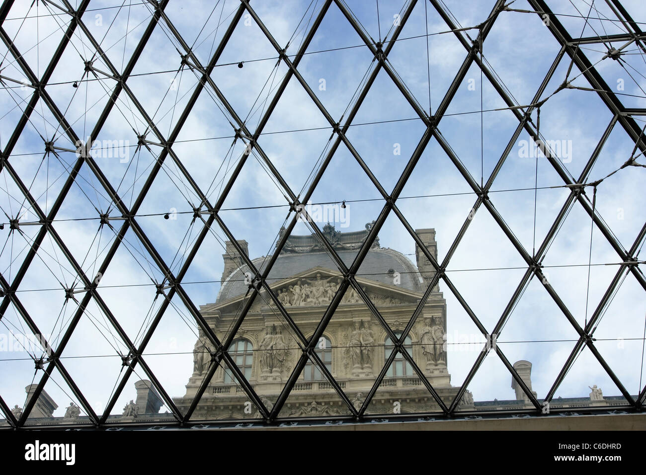 A view of the Louvre in Paris from inside the glass pyramid of the ...