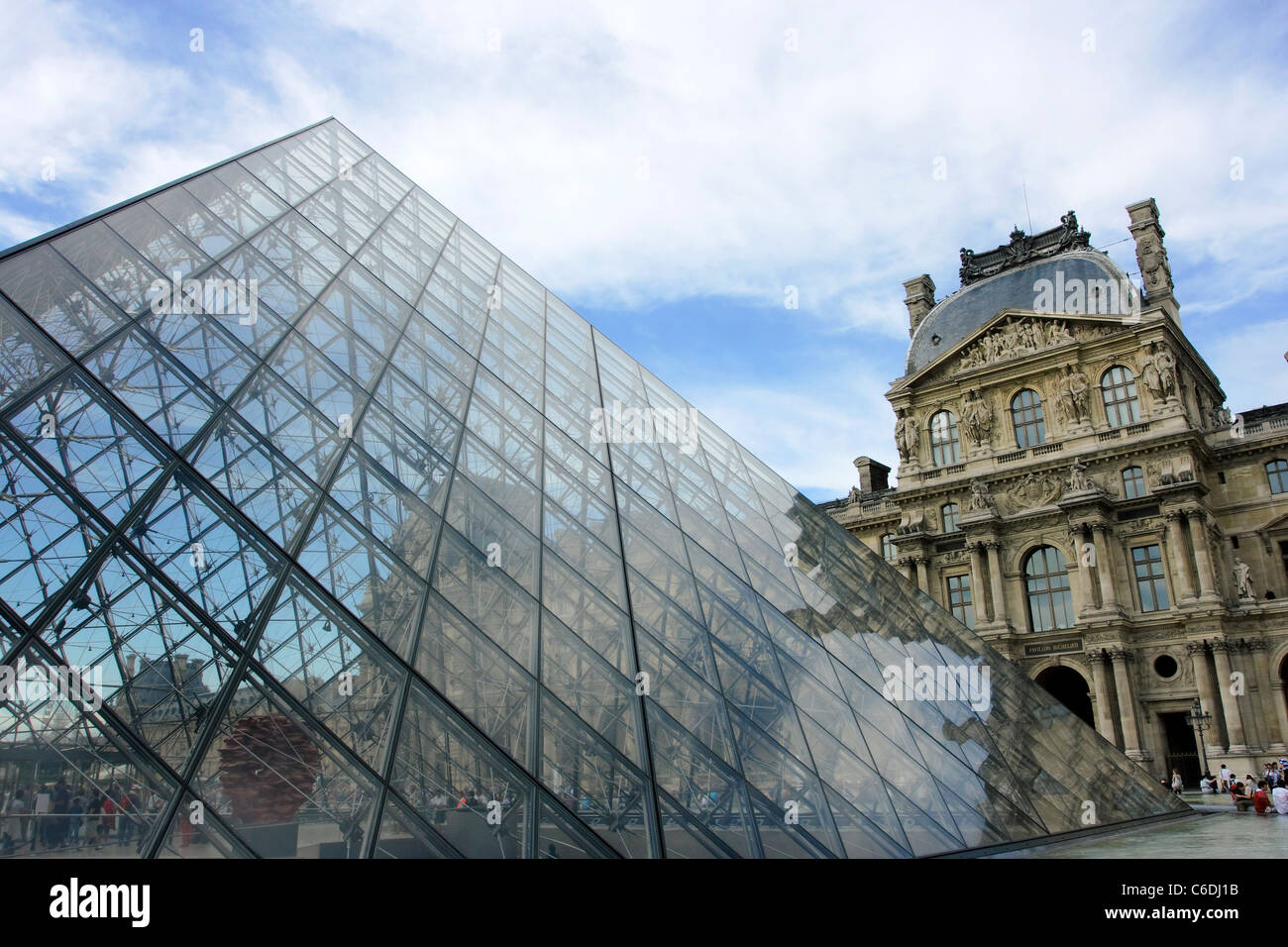 One of the glass pyramids in the courtyard of the Louvre in Paris Stock ...