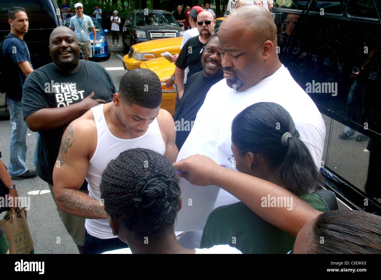Nelly rapper signs autographs surrounded by fans while outside his ...