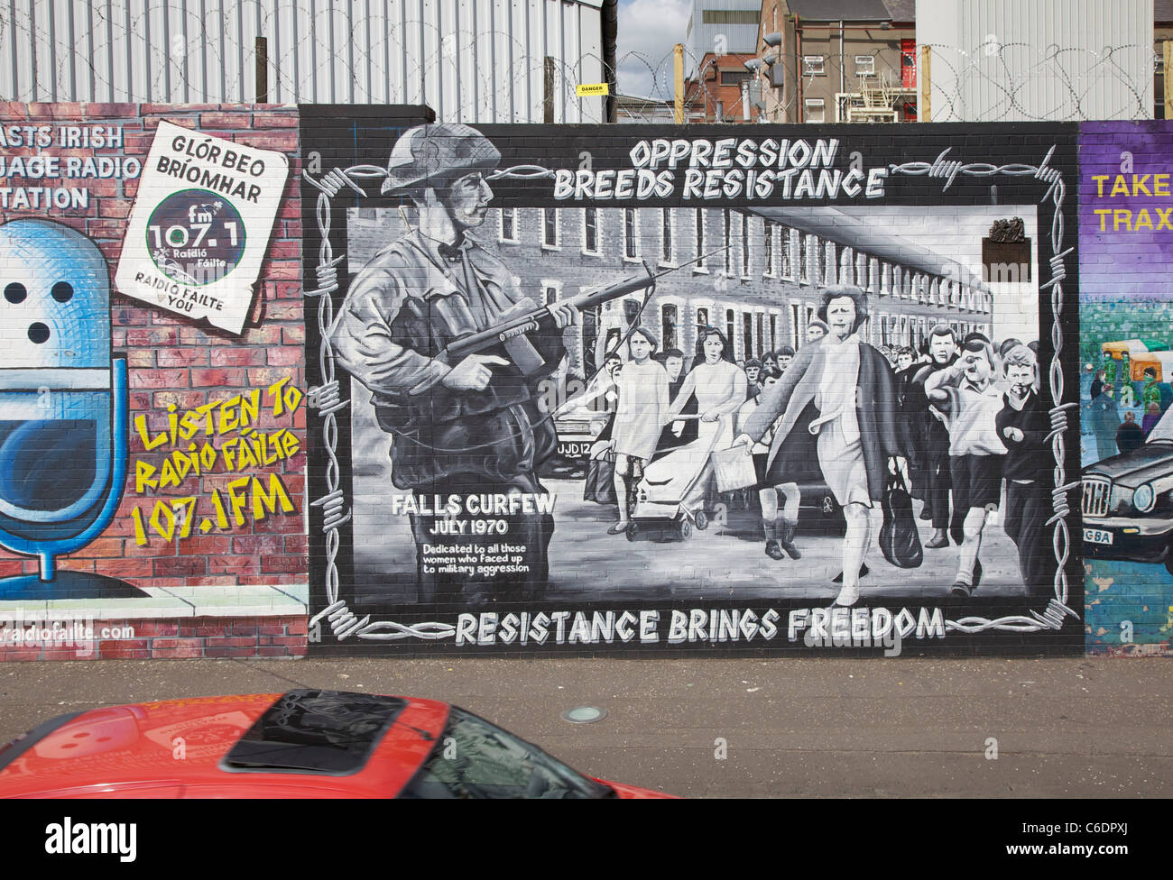 Resistance brings freedom poster in Falls Road Belfast Stock Photo - Alamy